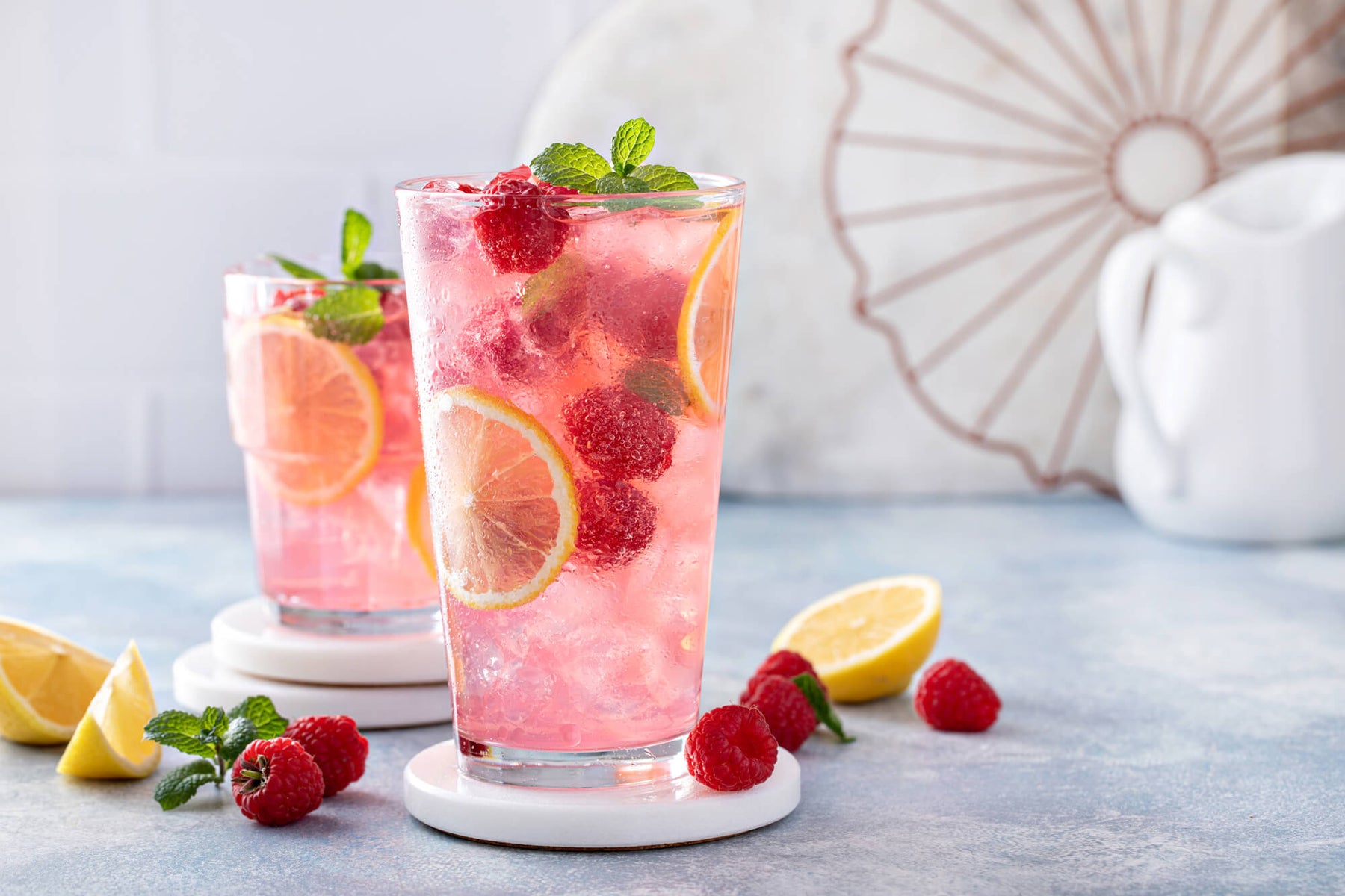Raspberry Collins Cocktail With Saint Juniper Pink Gin